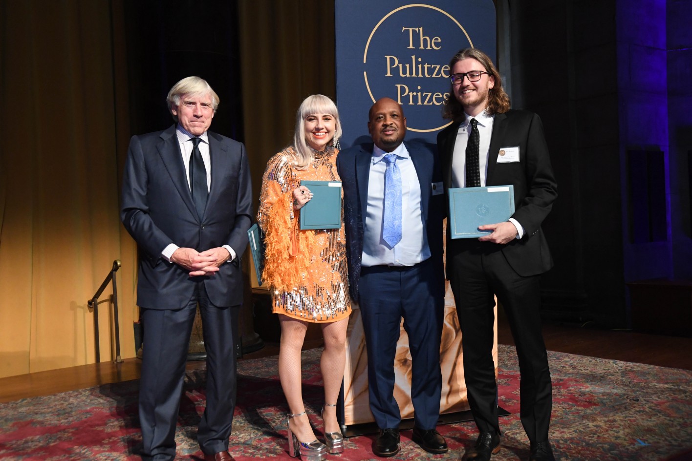 Corey G. Johnson, Rebecca Woolington and Eli Murray of the Tampa Bay ...